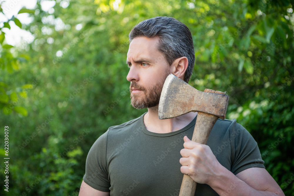 caucasian bearded masculine guy with axe. masculine guy with axe ...