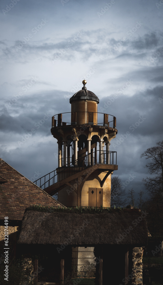 The tower from Queen's Hamlet in the night, the juxtaposition of ...