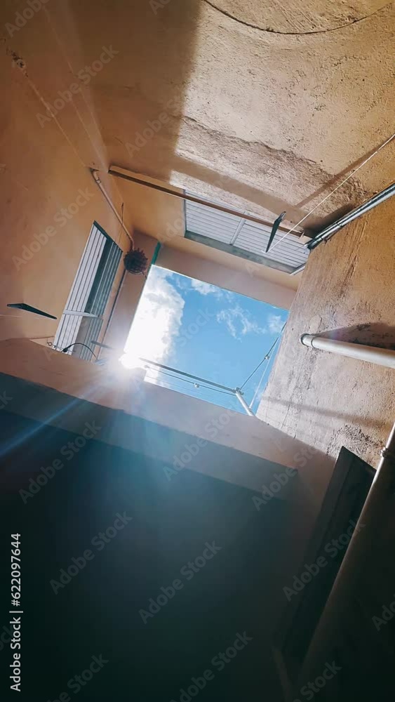 inside of an abandoned factory, looking up, sky, building, interior ...