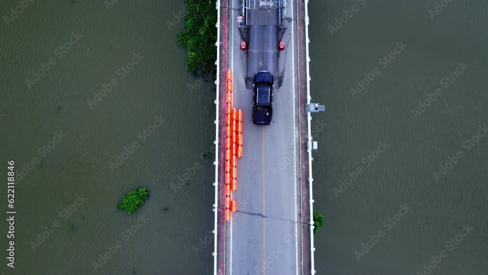 Repair of a concrete bridge across a river in the countryside. Repair ...