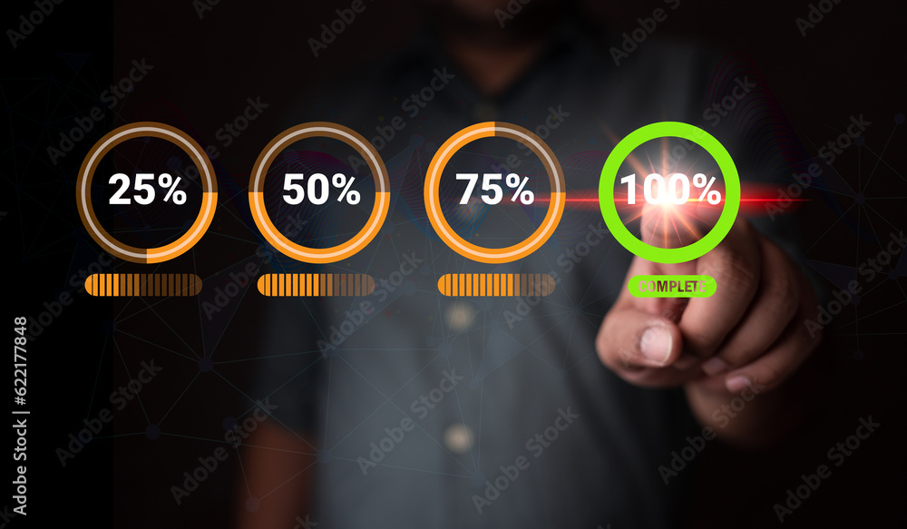 Man touching an icon of 100 percent on a virtual screen. Timeline to ...