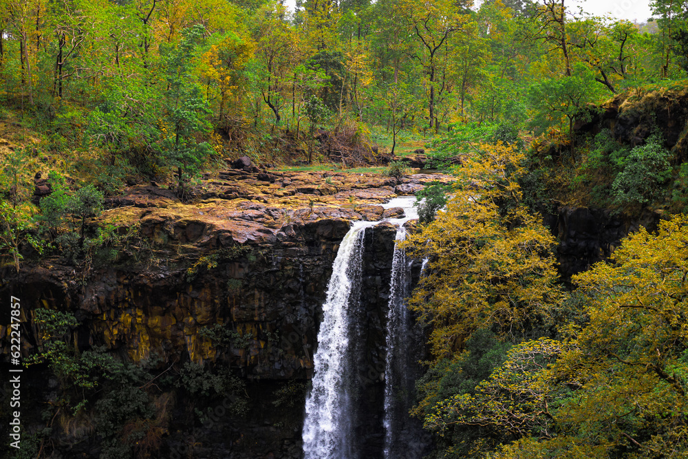 Tropical landscape. Beautiful hidden waterfall in rainforest. Adventure ...
