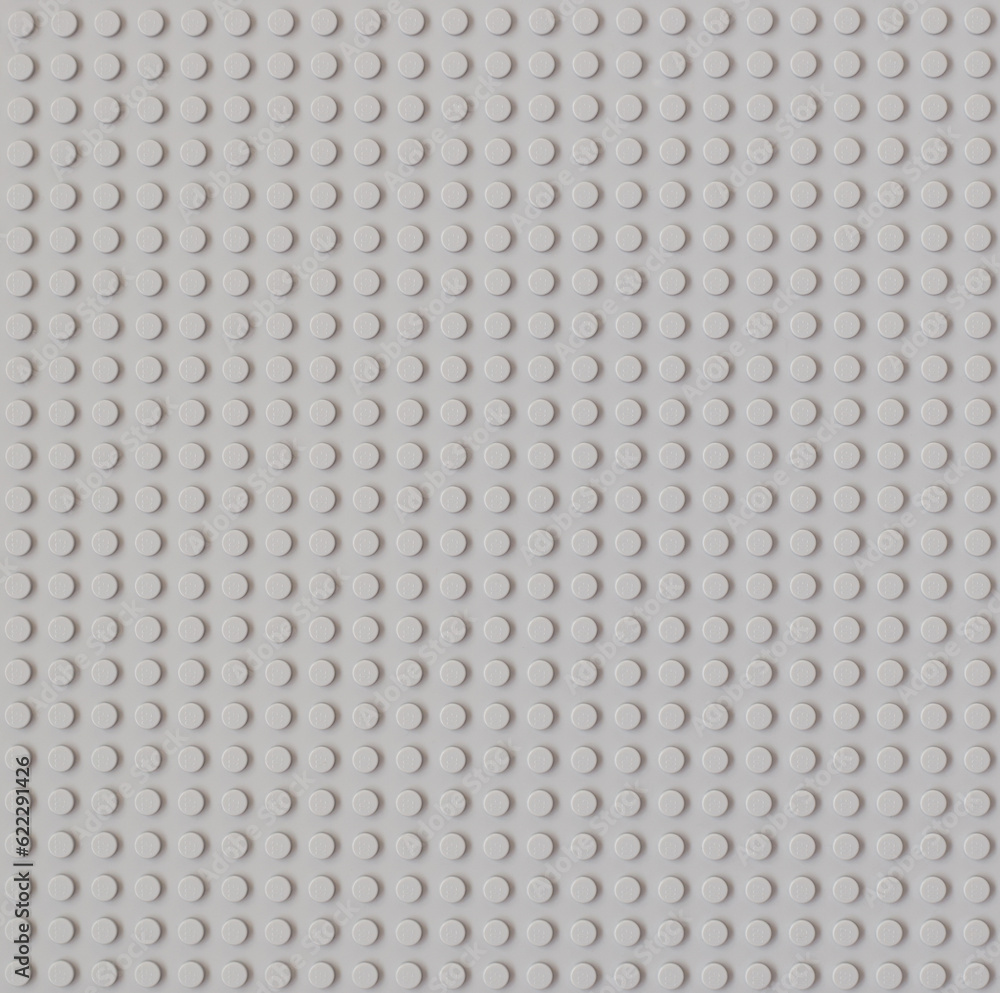 Lego gray baseplate empty with round knots to assembly plastic bricks from popular toy brand ...
