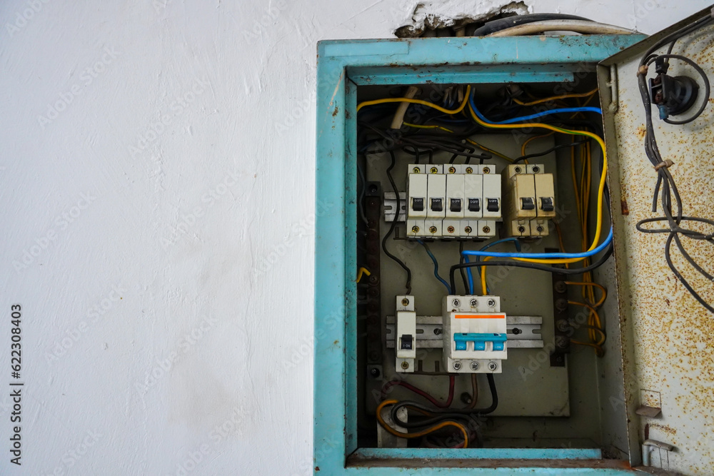 Power distribution board. Electrical panel with a row of fuses for ...