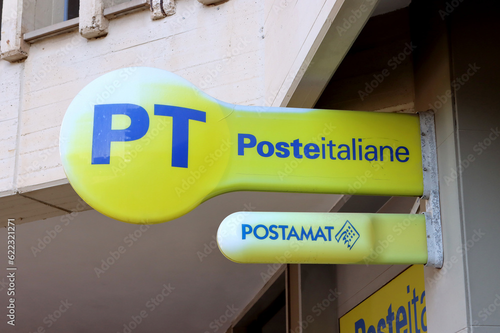 Italian Post Office sign, logo in corporate colours yellow and blue ...