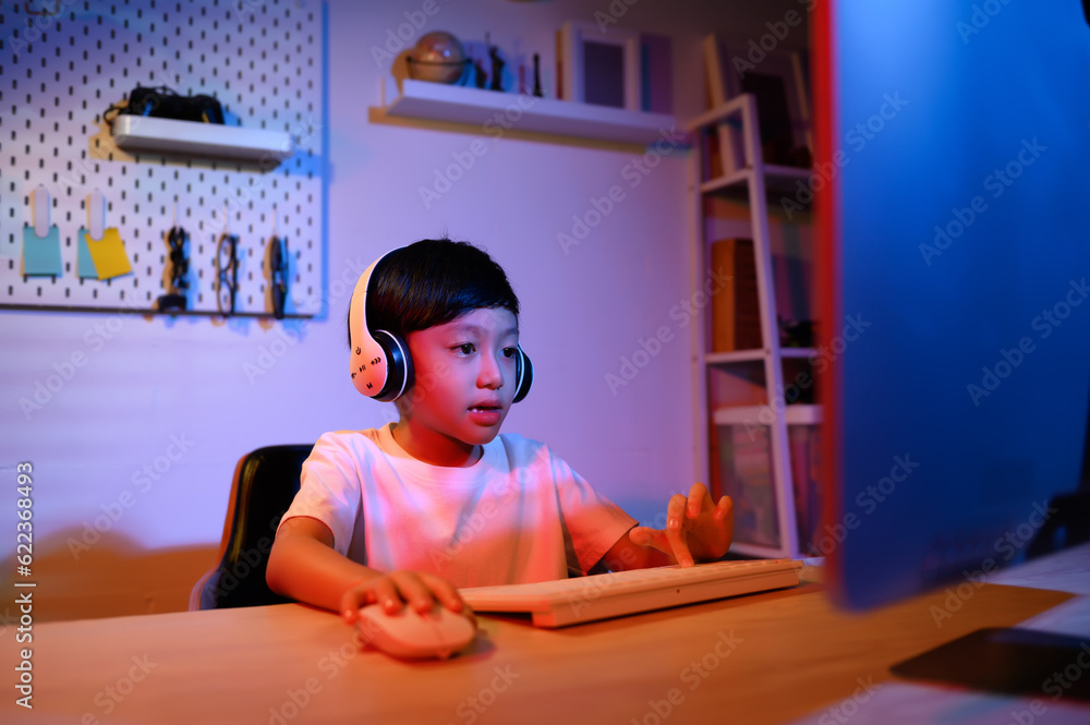 Asian Kid Boy tries to Gaming Stream on Computer Desktop for Fun and ...