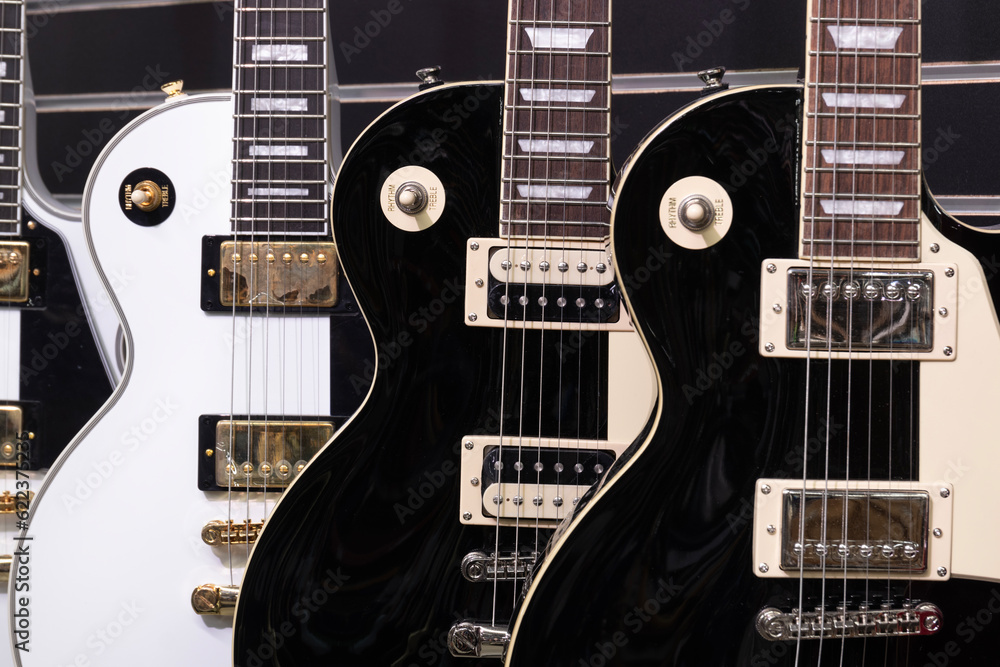 Les Paul guitar display at a music store. Les Paul guitars are ...