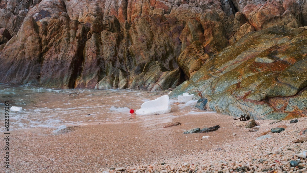 Disgusting nasty view of littered tropical beach filled with waste ...