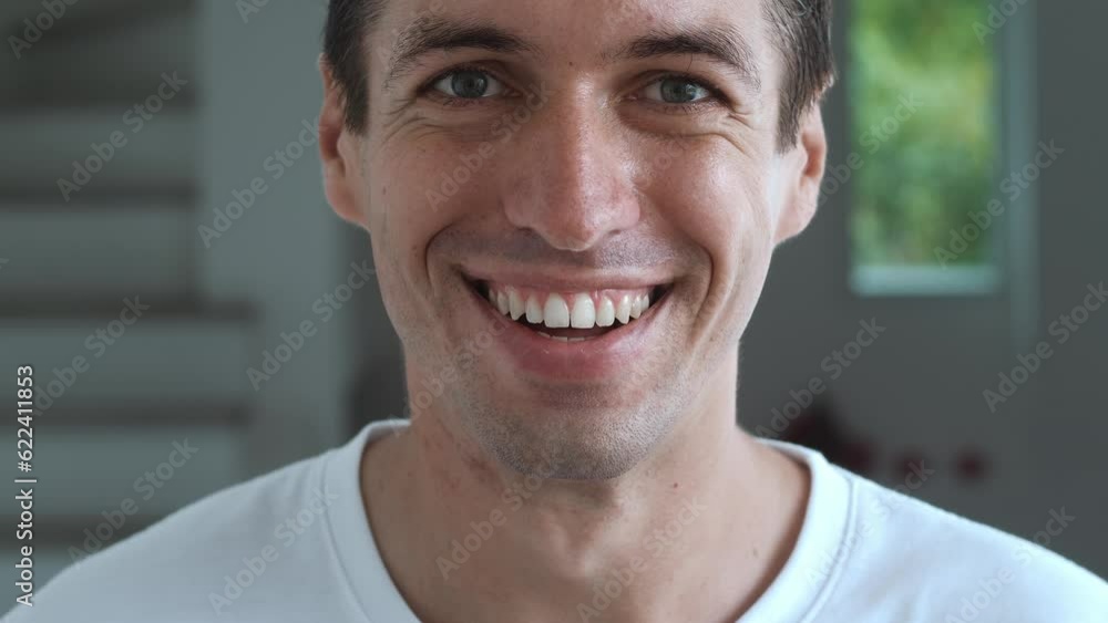 Close-up face of a man pleasantly surprised. Portrait of a surprised ...