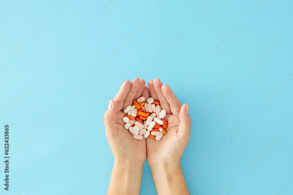 Disease treatment concept. First person top view photo of capsules and ...