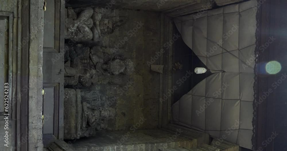 Vertical slow motion establishment shot of a balinese pavilion bale ...