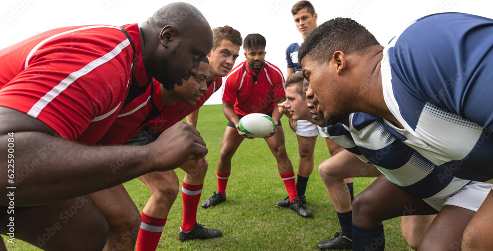 Digital png photo of diverse two groups of male rugby players on ...