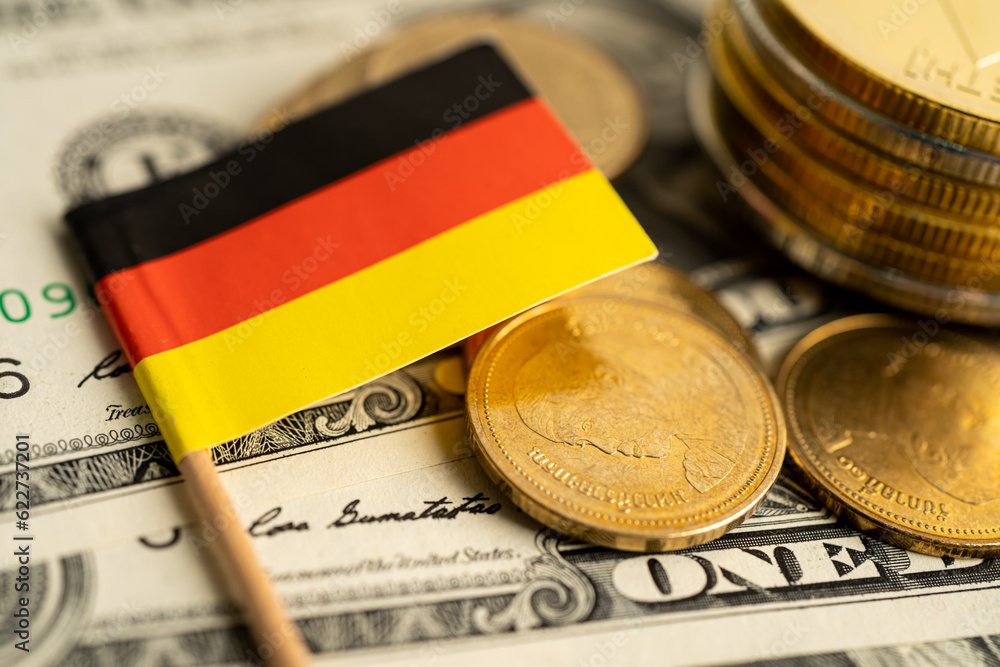Stack of coins with Germany flag and US dollar banknotes. Stock Photo ...