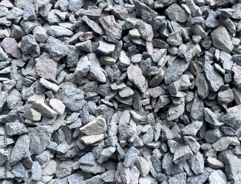 Material coral stone for the road foundation layer. Closeup of a pile ...