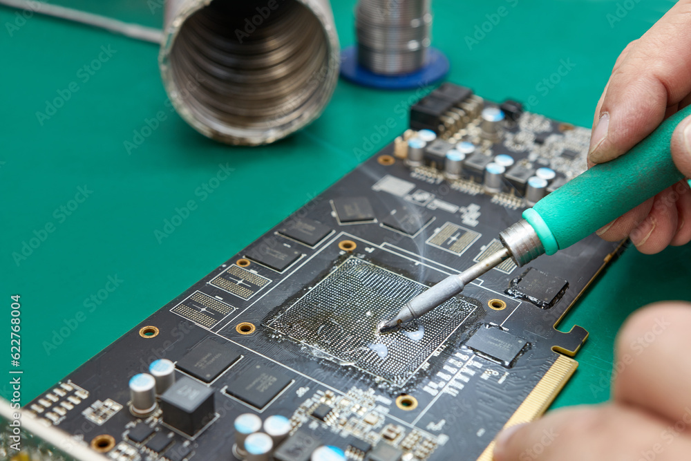 Cleaning the contact group of the video card for soldering the GPU chip ...