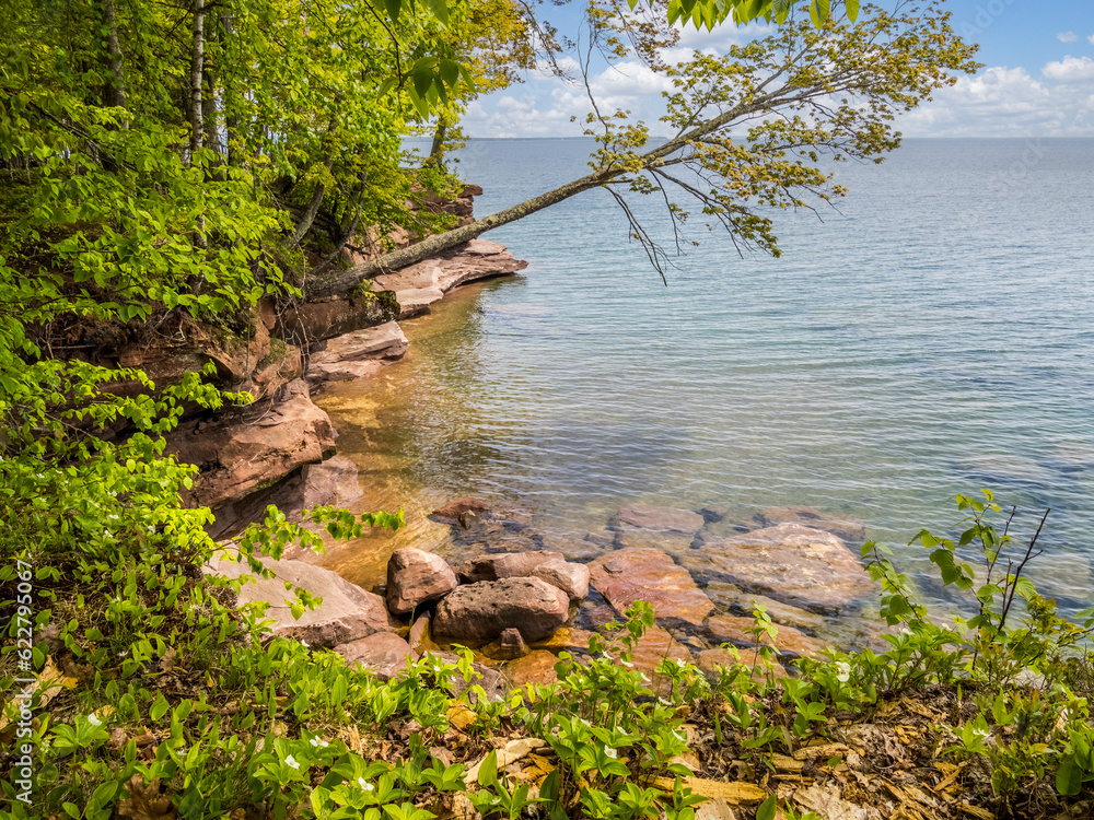 Rocky coastline of Lake Superior in Big Bay State Park in La Pointe on ...
