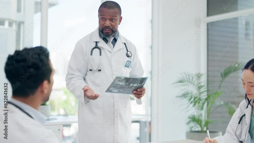 Doctors, conference meeting and xray for surgery planning, discussion ...