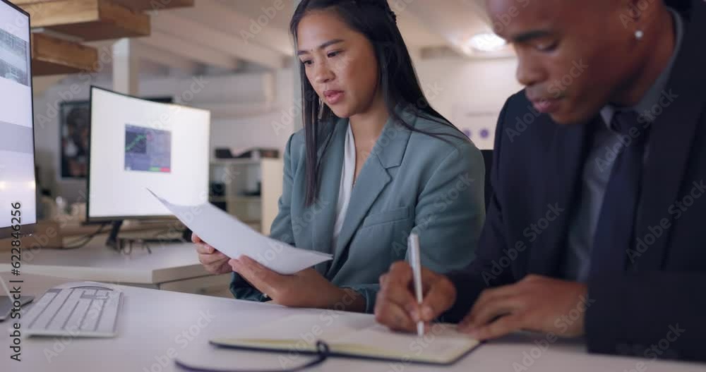 Night, man and woman in office together with computer, paperwork and ...