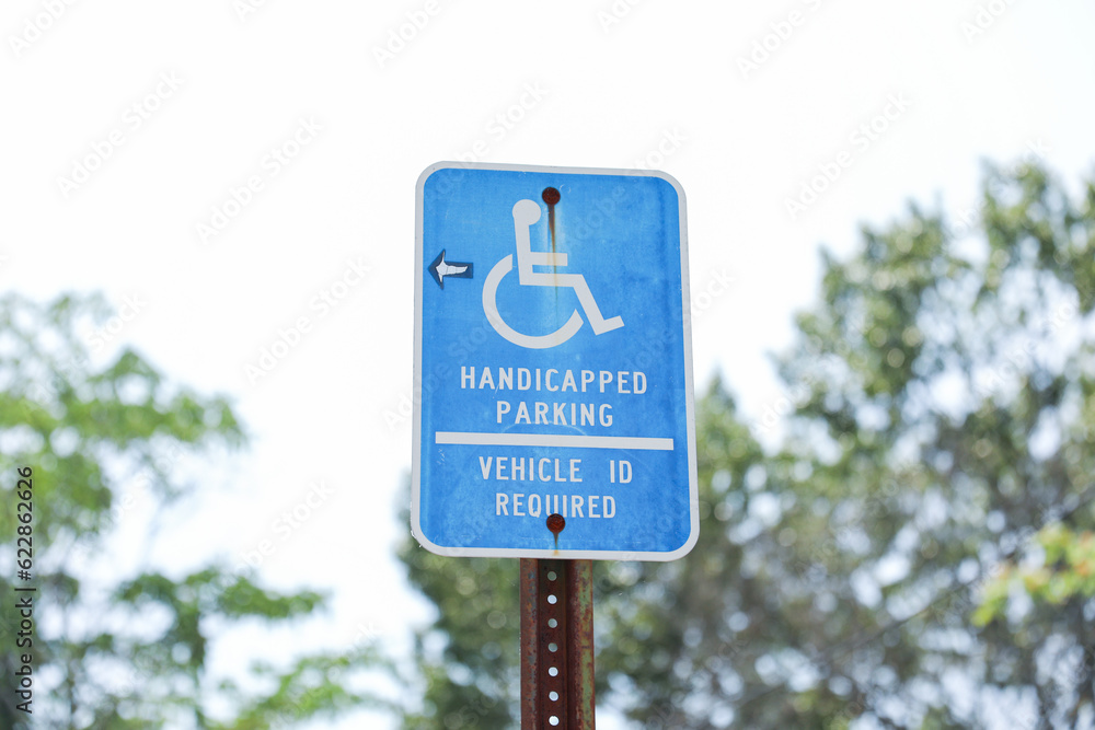 blue wheelchair symbol on a white background. The handicap sign ...