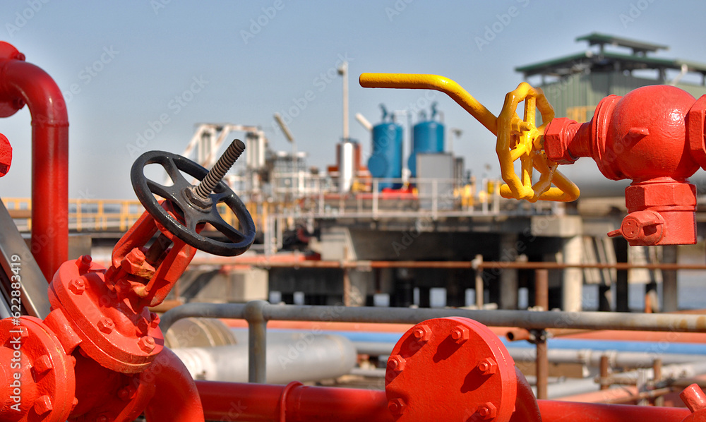 colourful valve pipes and control points on a refinery jetty-Victoria ...