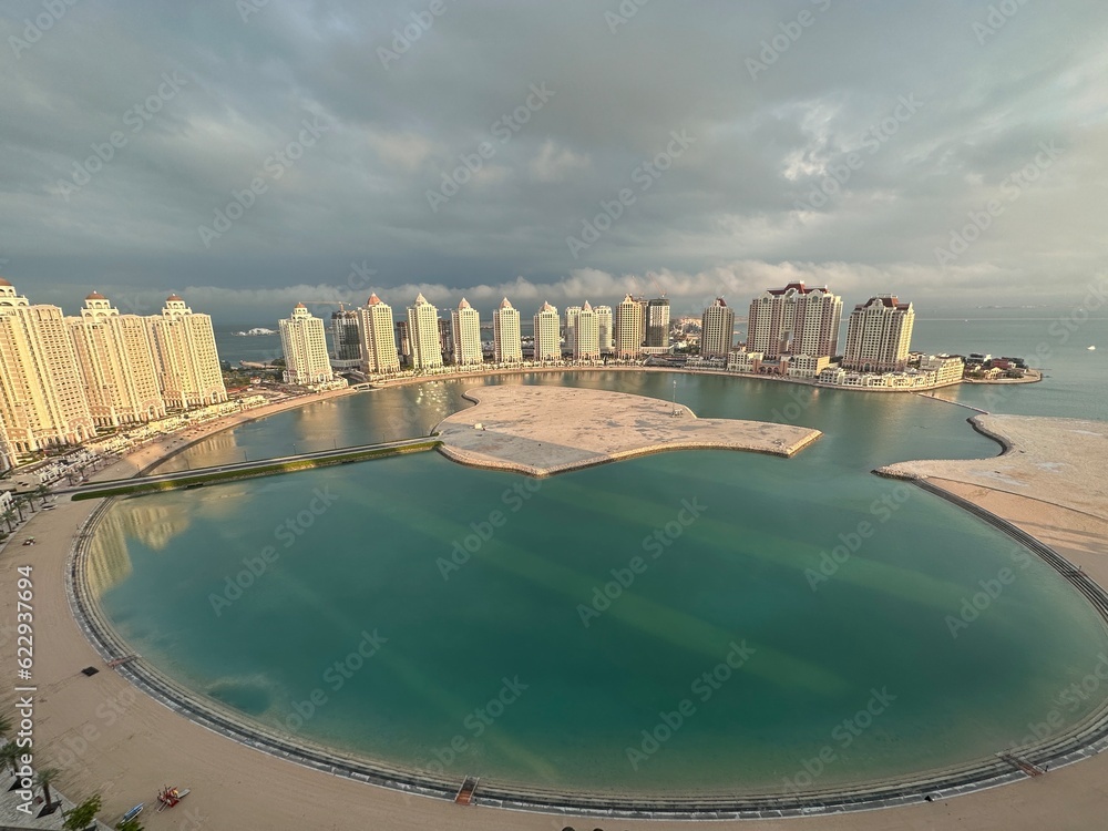 Residential buildings in the Pearl Qatar, an artificial island in Doha ...