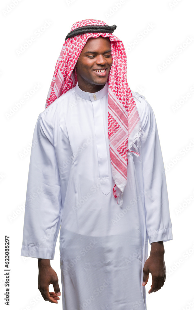 Young arabic african man wearing traditional keffiyeh over isolated ...