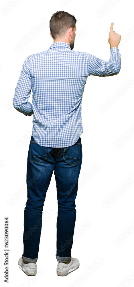 Handsome business man with blue eyes Posing backwards pointing behind ...