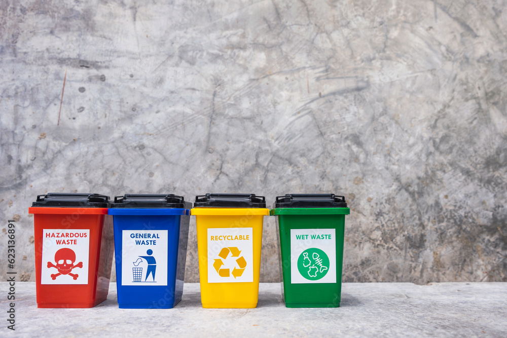 The concept of waste classification for recycling. Collection of bins for different types of ...
