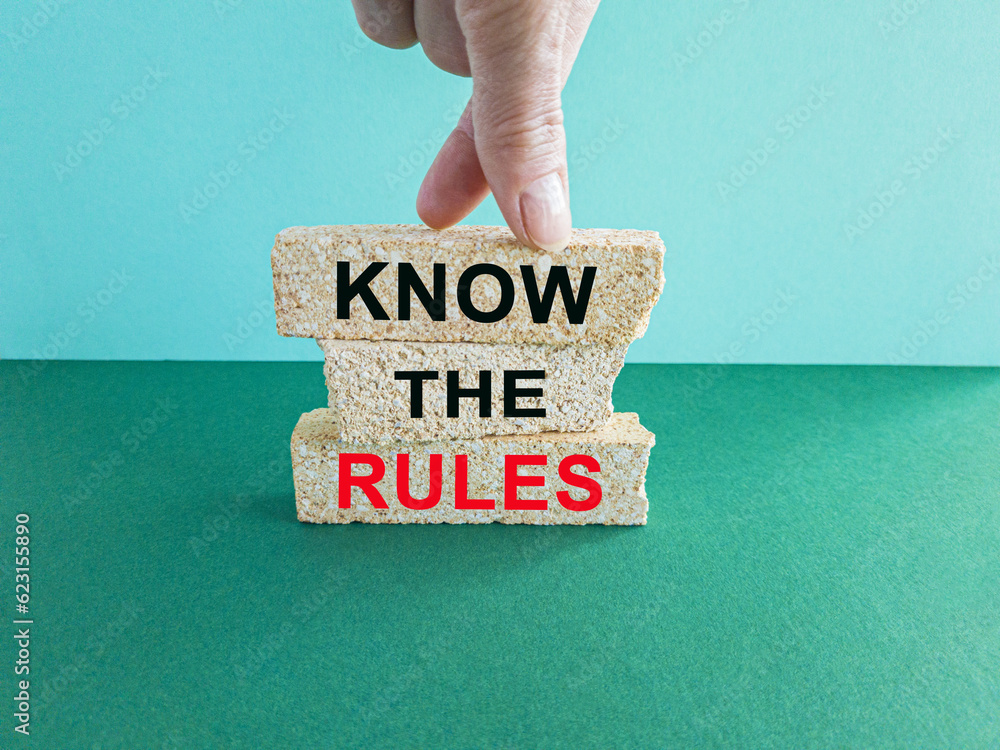 Know the rules symbol. Brick blocks with words know the rules. Male ...