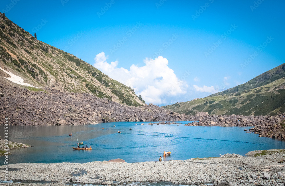 People boating on a Mountain Mini katora lake jahaz banda and having ...