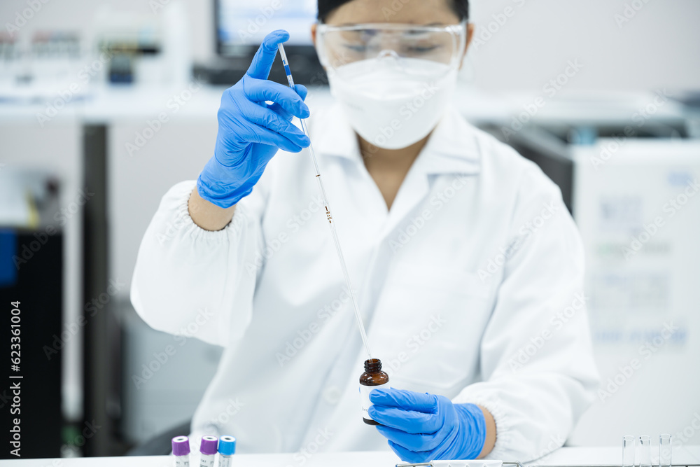 Selective focus woman scientist wearing blue gloves hand holding and ...