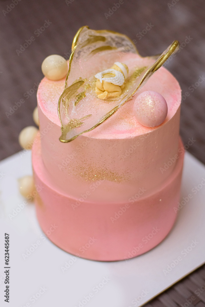 Christening pink cake for baby, cake with wings. Christening party candy bar Stock Photo | Adobe ...