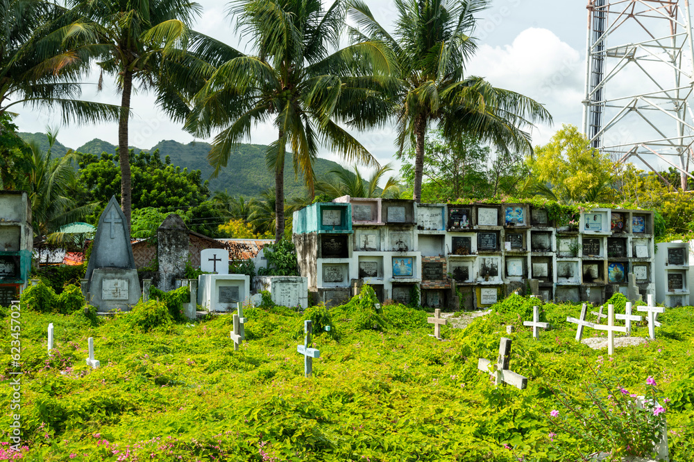 Oslob Public Cemetery,overgrown by tropical vegetation,surrounding ...