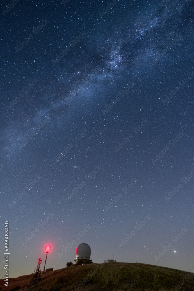 German night sky with milky way around a mountain called Wasserkuppe ...
