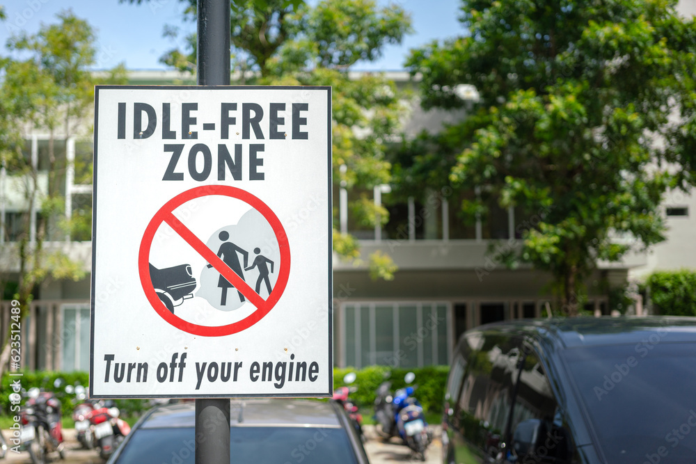 "Idle-Free zone" symbol banner at public vehicle parking lot, the ...