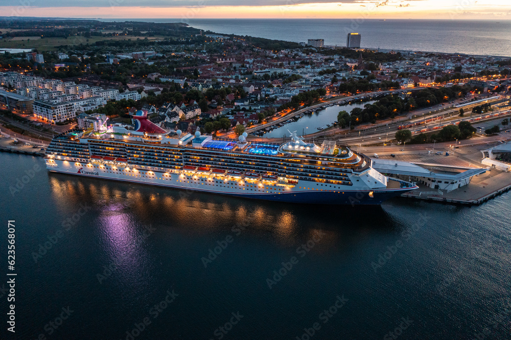 Rostock, Warnemuende, Germany, aerial dusk view of illuminated cruise ...