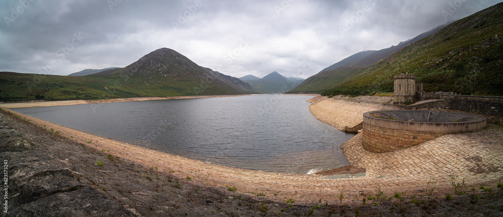 Misty panoramic view of Mourne Mountains. Silent Valley water reservoir ...