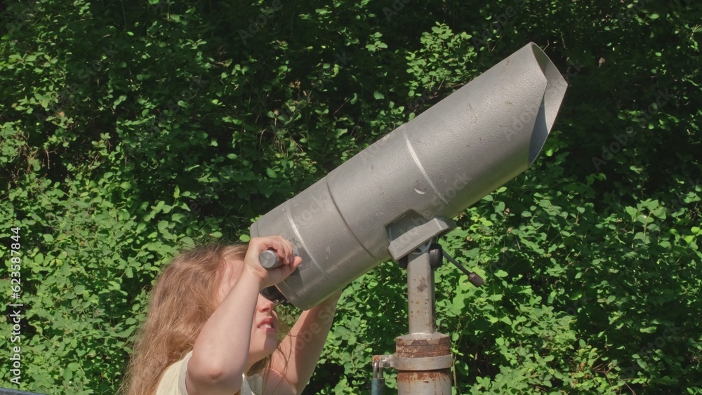 Caucasian Girl Looking Through Coin Operated Tourist Telescope ...