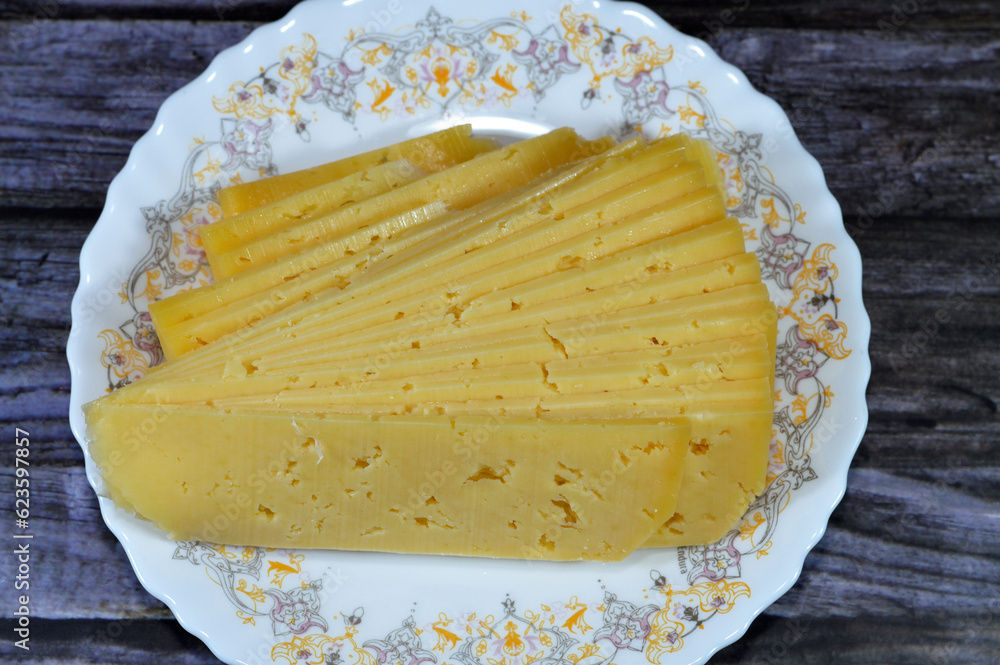 Slices of Egyptian Rumi cheese, also called gebna romiya or gebna ...