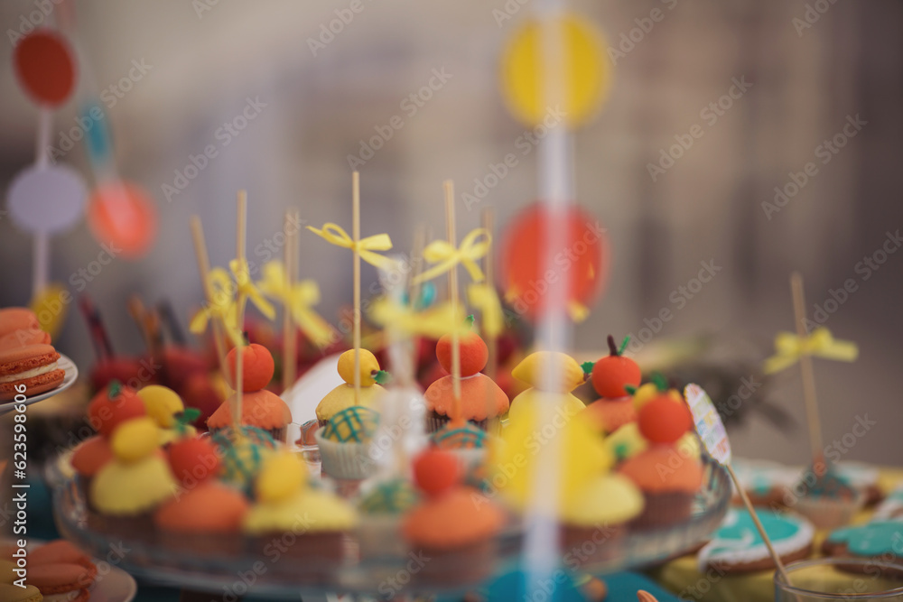 Colorful candies with baby and newborn symbol. Candy bar with Sweets in ...