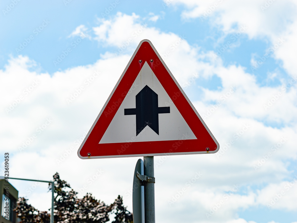 Right of way traffic sign next to a street in Germany. The symbol tells the user that this road ...