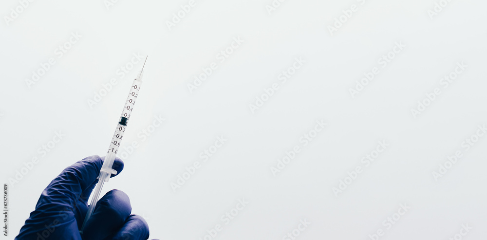Web banner of syringe vaccine over white background and copy space. Medical concept. Insurance ...