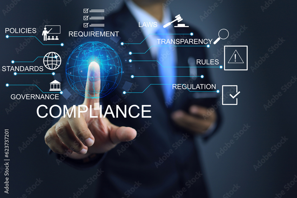 Compliance graphic building up or creating by businessman on the dark ...