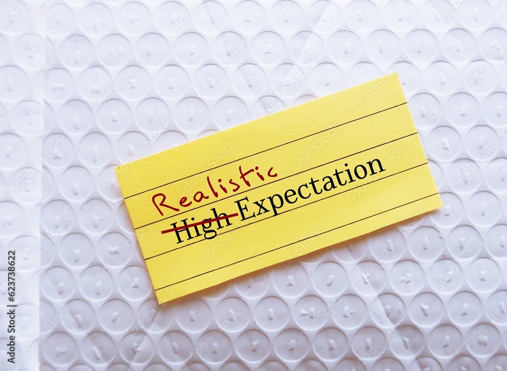 Note on envelope with handwritten text HIGH EXPECTATION crossed HIGH of ...