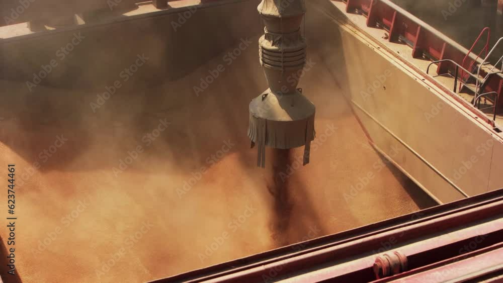 Grain loading to bulker ship cargo container at sea grain terminal in ...