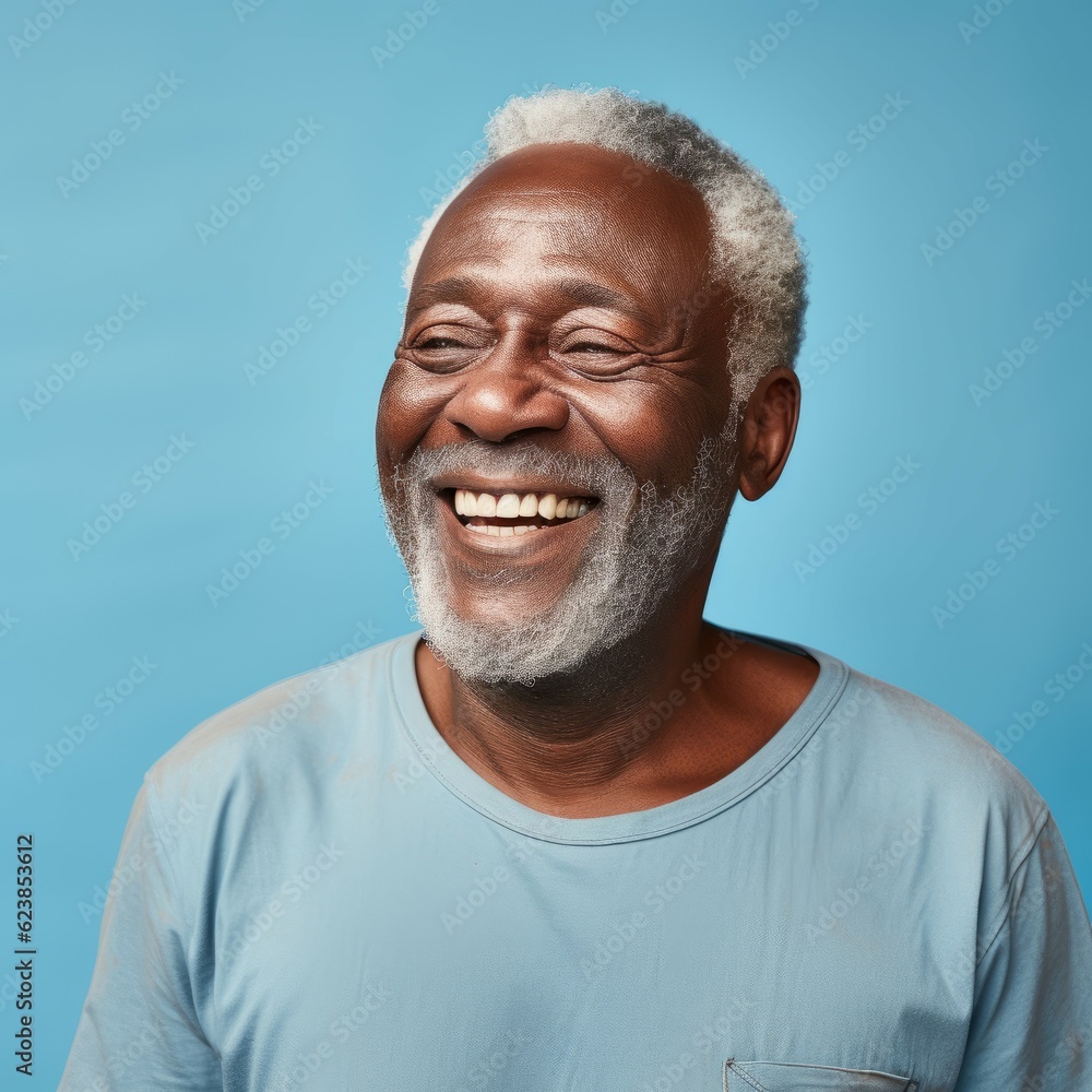 Portrait of a smiling senior African man with gray hair. Closeup face ...