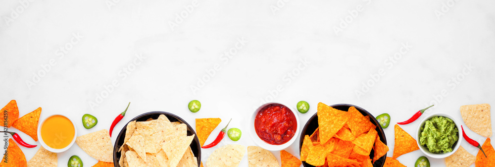 Nachos and dip bottom border. Top view on a white marble banner ...