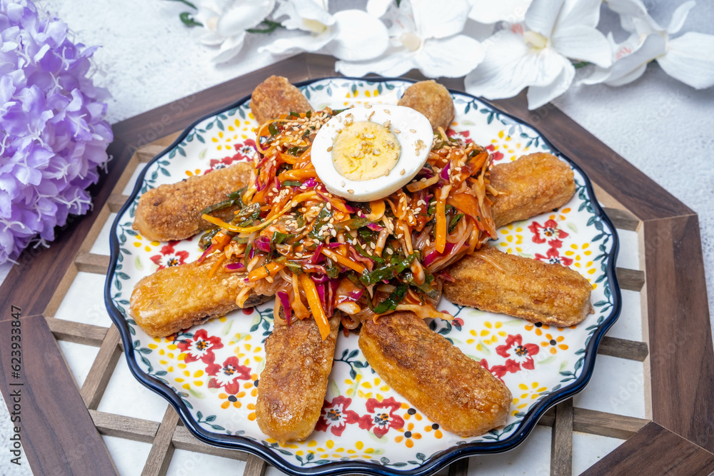 Delicious Korean Food Deep-fried Mandu and Vegetables in Spicy Sauce ...
