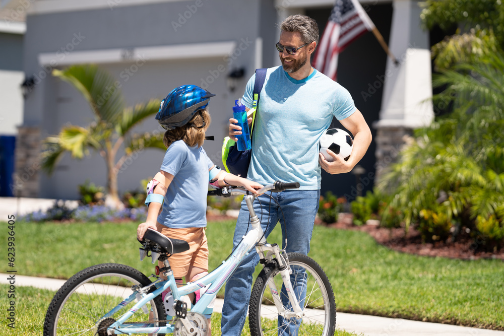 Foto de father and son navigate the path together. special bonding moment. Father and son ...