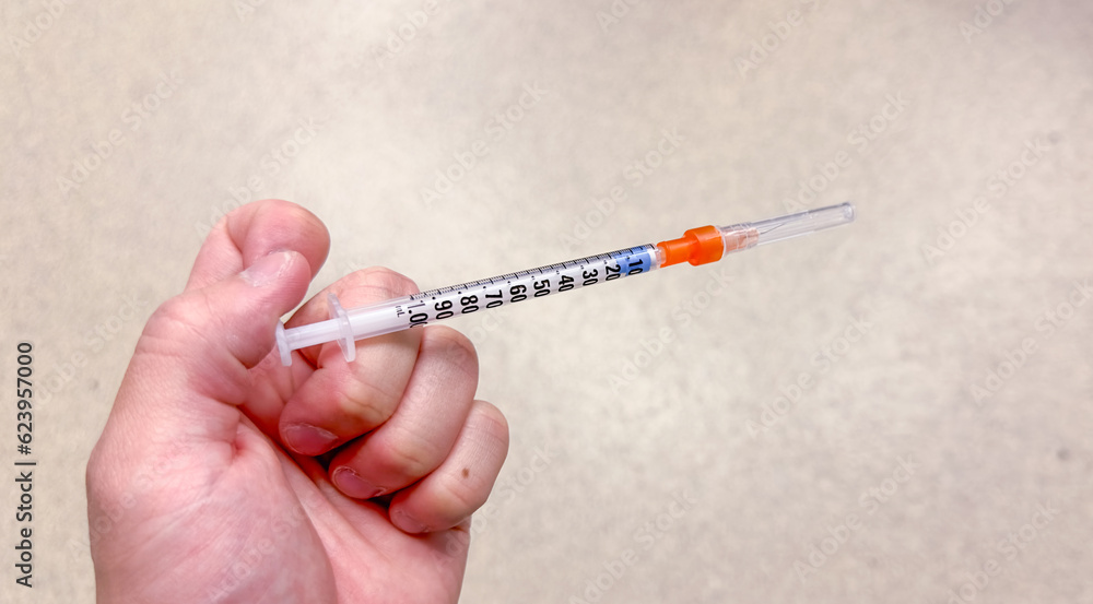 Stacked hospital drugs, syringe, and narcotics symbolize medical ...